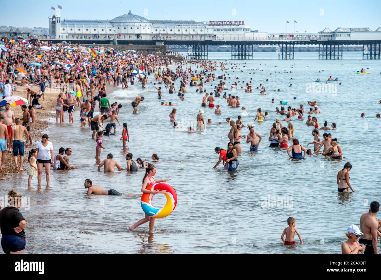 Brighton UK, August 9th 2020: Crowds on the seafront of Brighton and ...