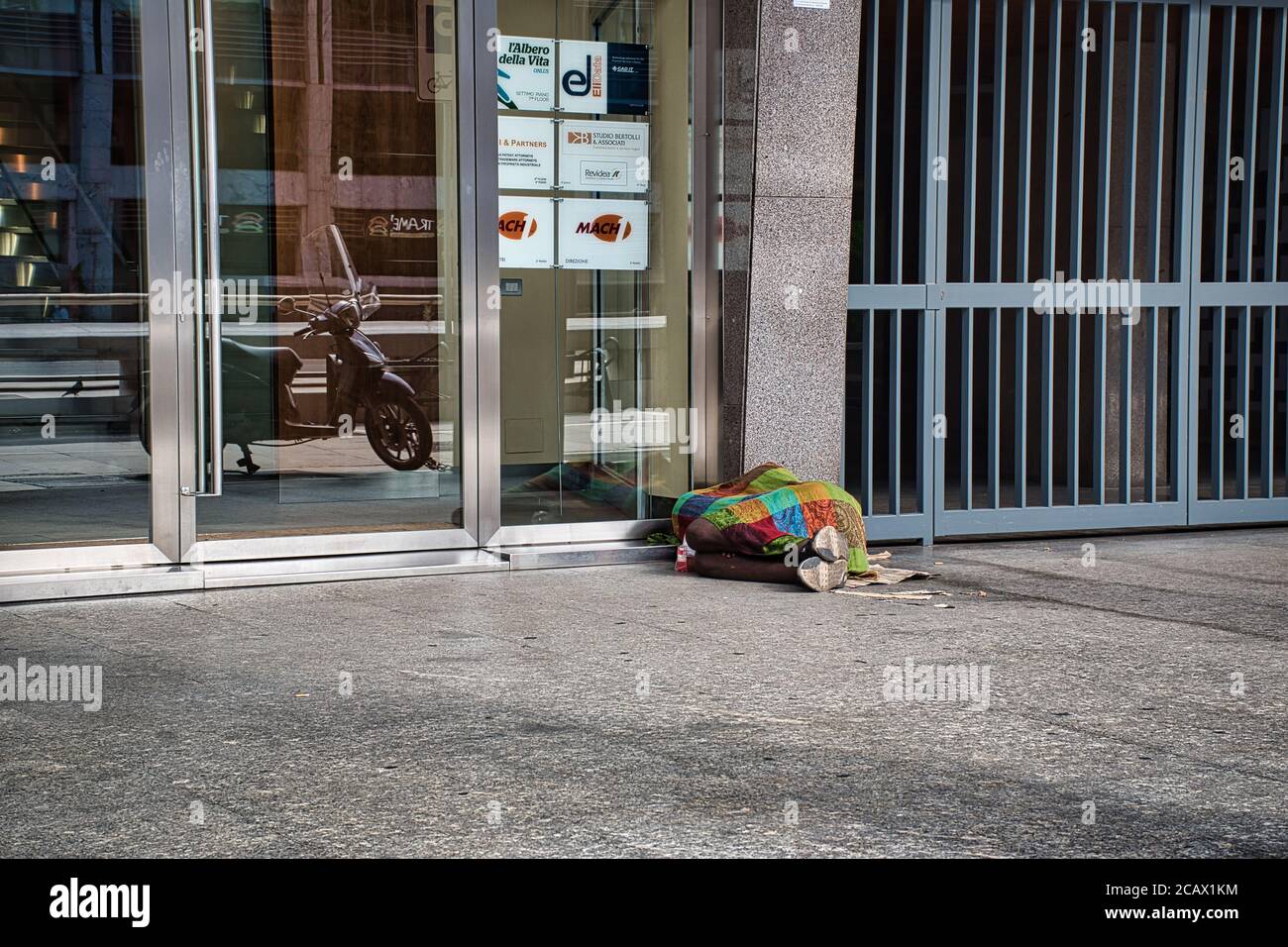 Milan, Italy 08.08.2020: Homeless people on the streets of Milan Stock ...