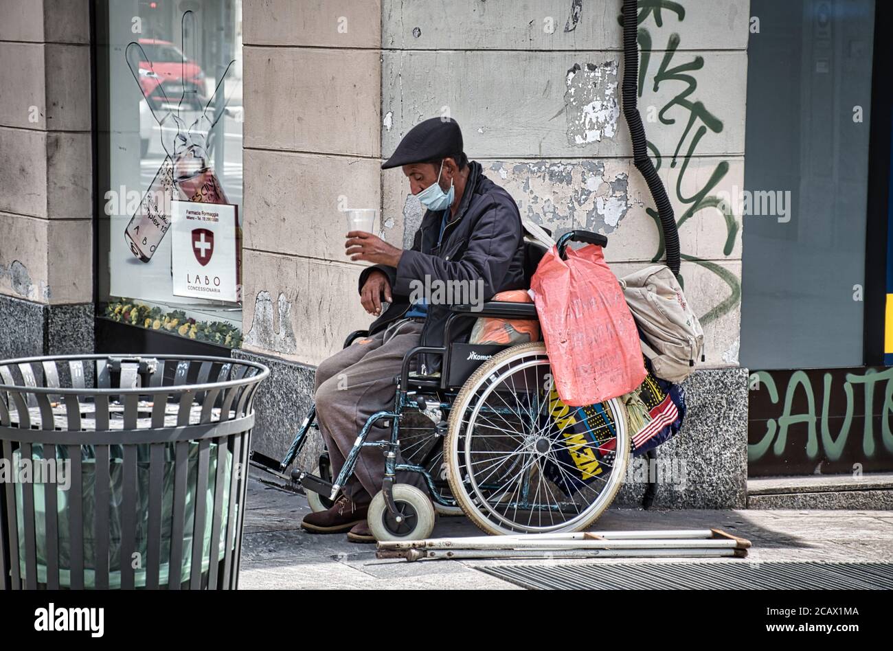 Milan, Italy 08.08.2020: Homeless people on the streets of Milan Stock ...