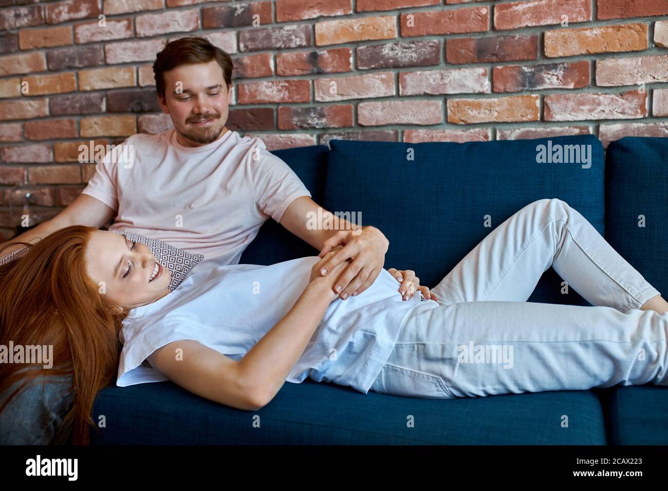 cute married couple expecting baby, adorable man and woman have ...