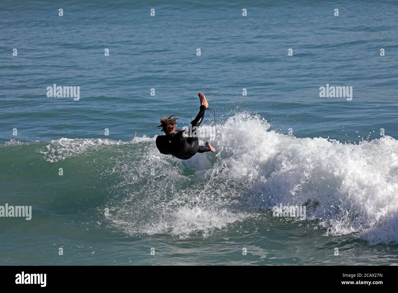 Surfer falling into sea hi-res stock photography and images - Alamy