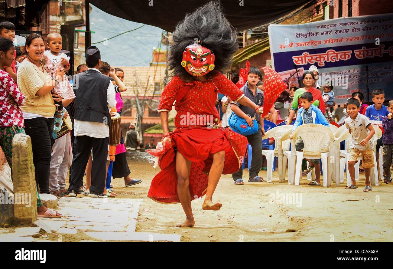 Lalitpur, Nepal. 9th Aug, 2020. A masked dancer, popularly known as ...