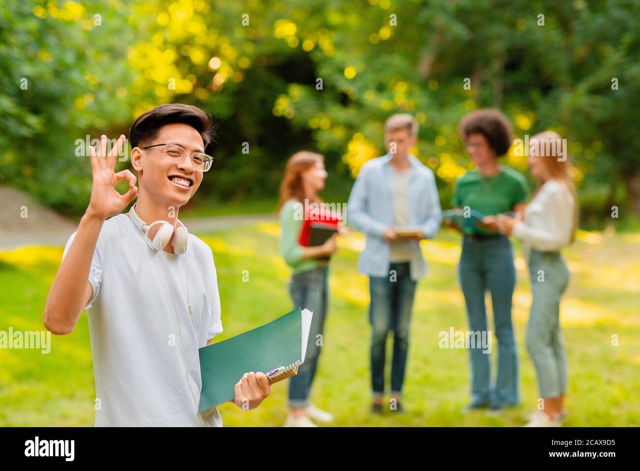 Laughing chinese female student hi-res stock photography and images - Alamy