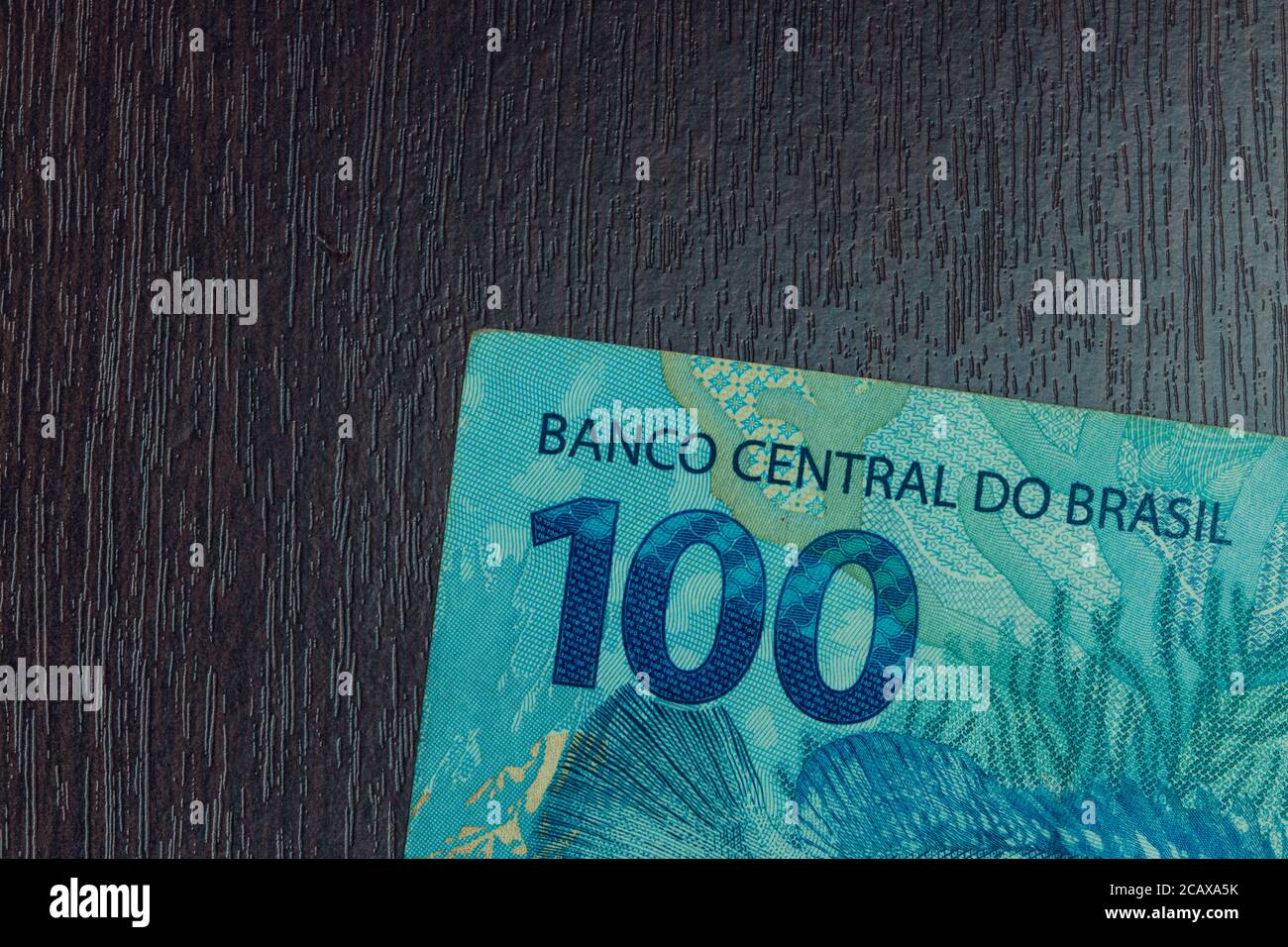 Closeup at 100 bill Brazilian money Stock Photo - Alamy