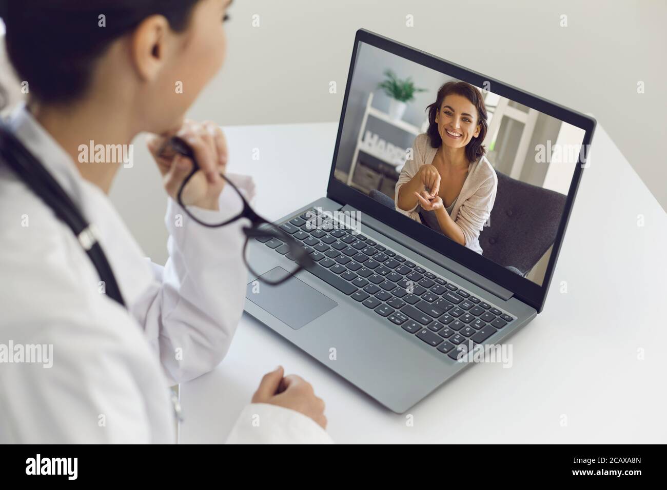 Doctor online. Doctor using video call. Female doctor video conference ...