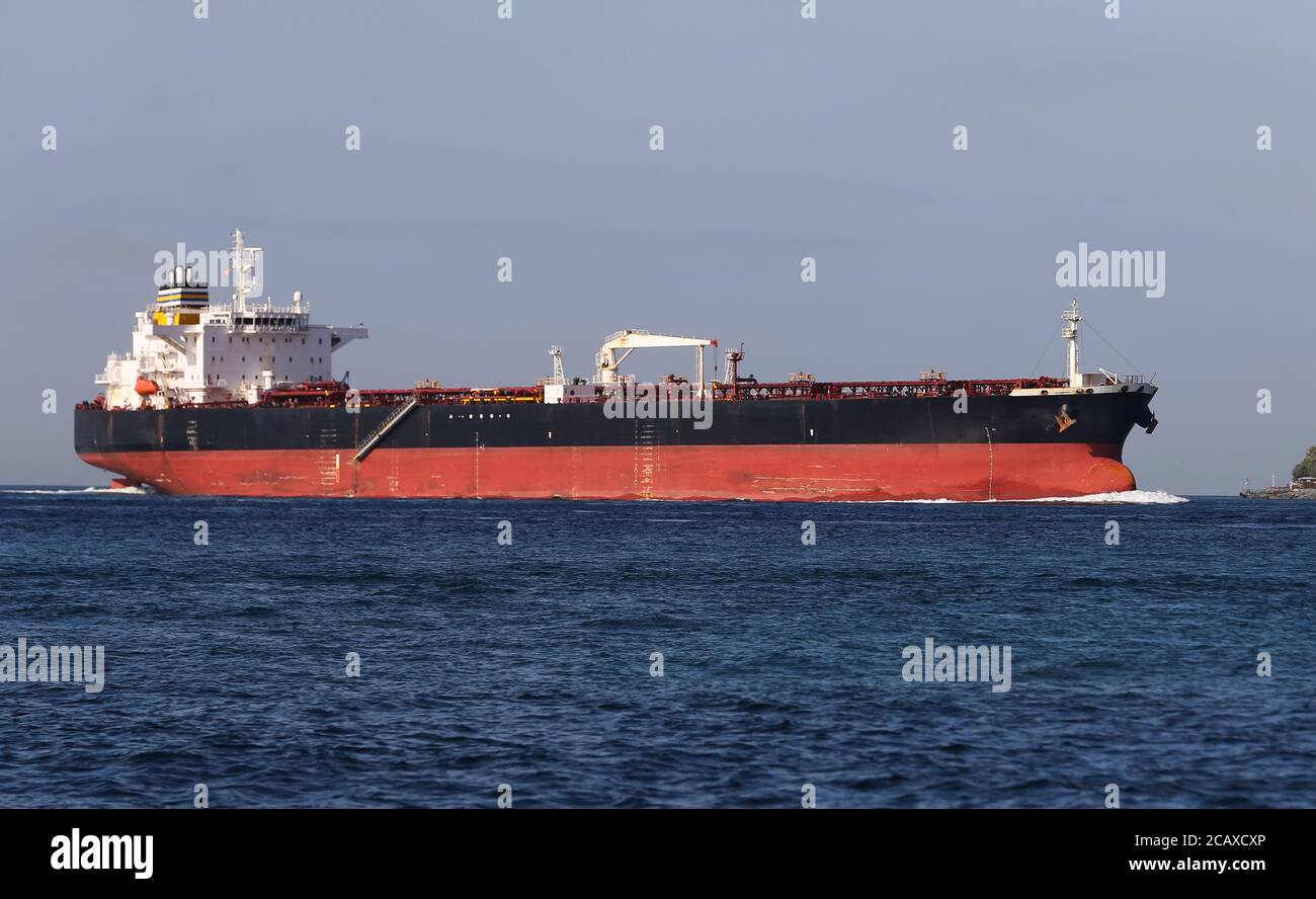 A cargo ship carrying goods between ports Stock Photo - Alamy