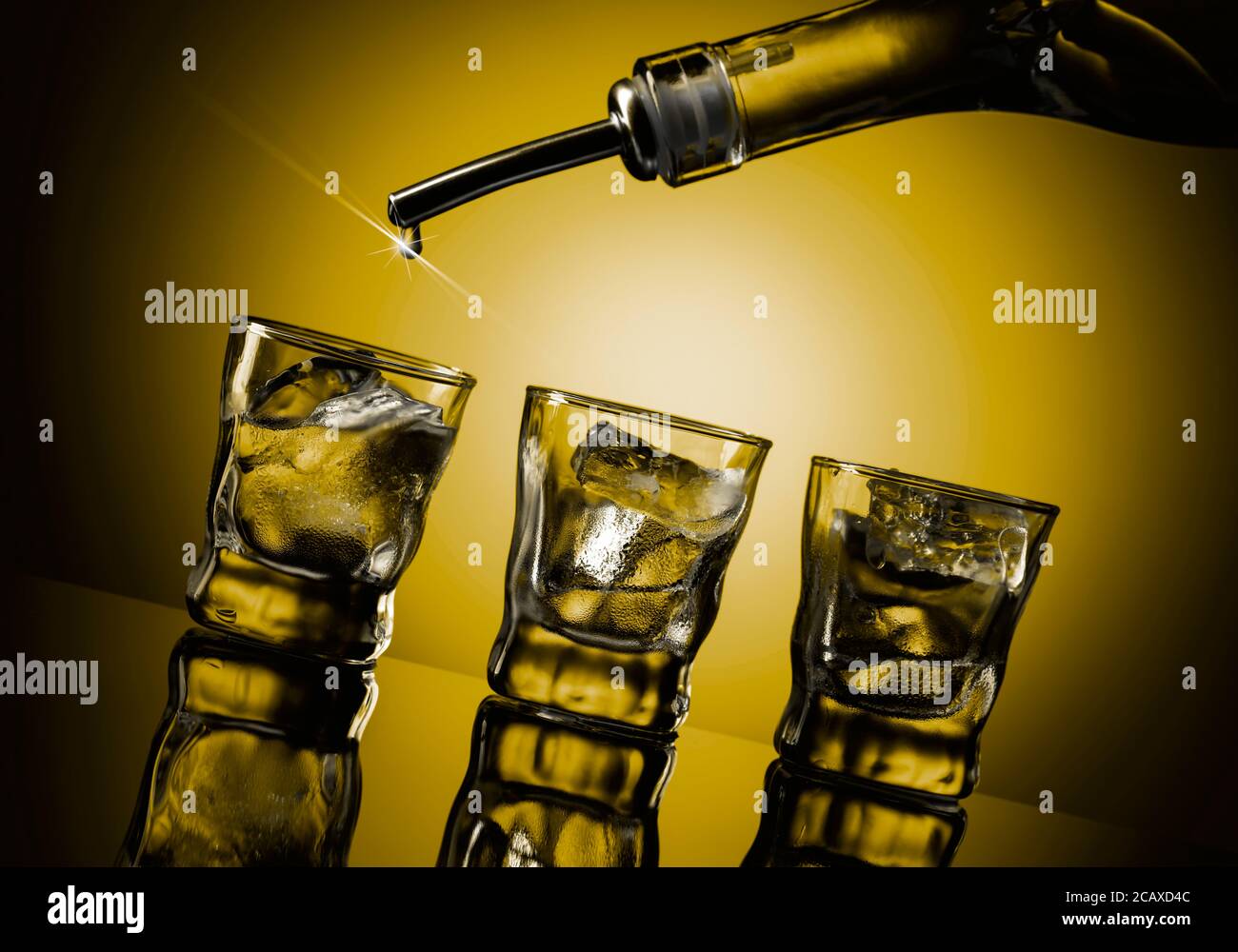 Silhouette of glasses with ice on a yellow background.. Copy space ...