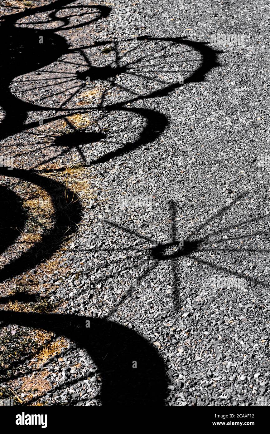 Shadows of Wheels on the Ground Stock Photo - Alamy
