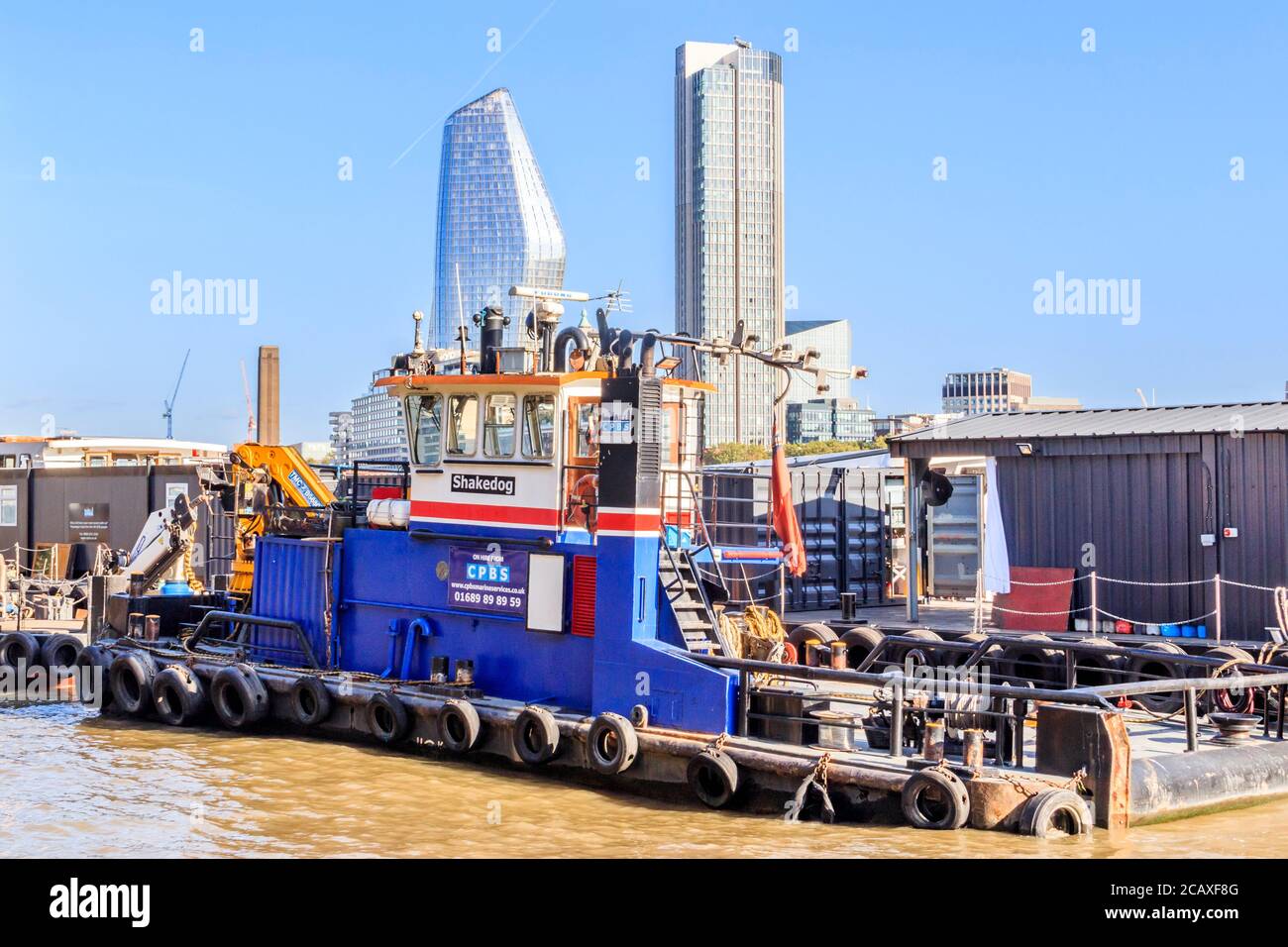 MPV Shakedog, a multi-cat type workboat with crane and winch moored in ...