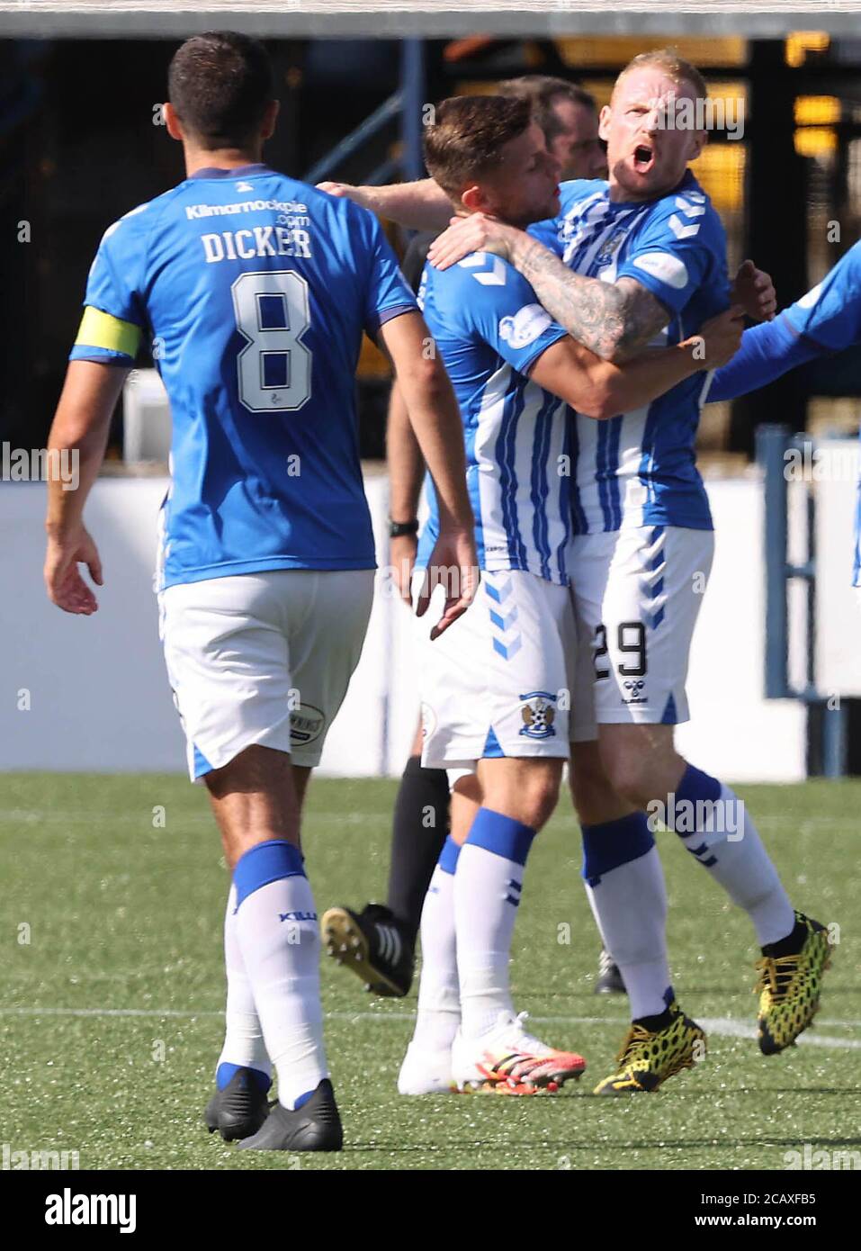 Kilmarnock's Chris Burke (centre) celebrates scoring his side's first ...