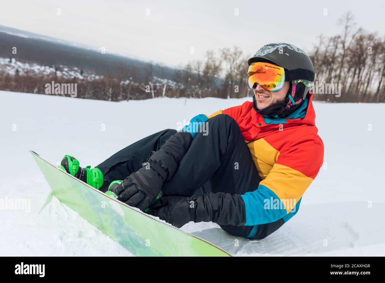 Strapping into snowboarding hi-res stock photography and images - Alamy