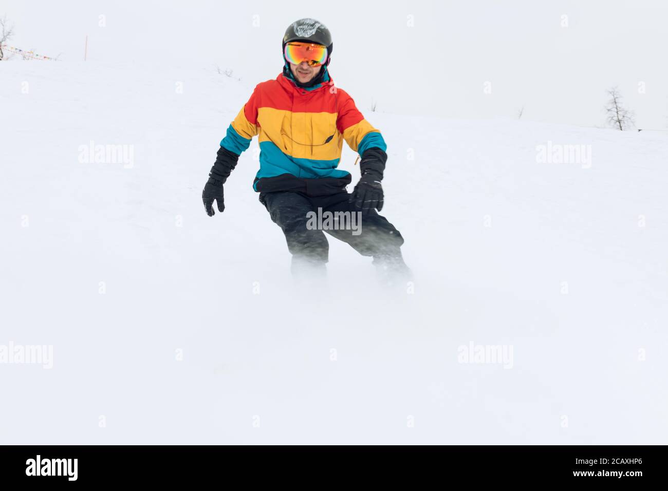 active sportsman learning the shuss from the mountain. full length ...