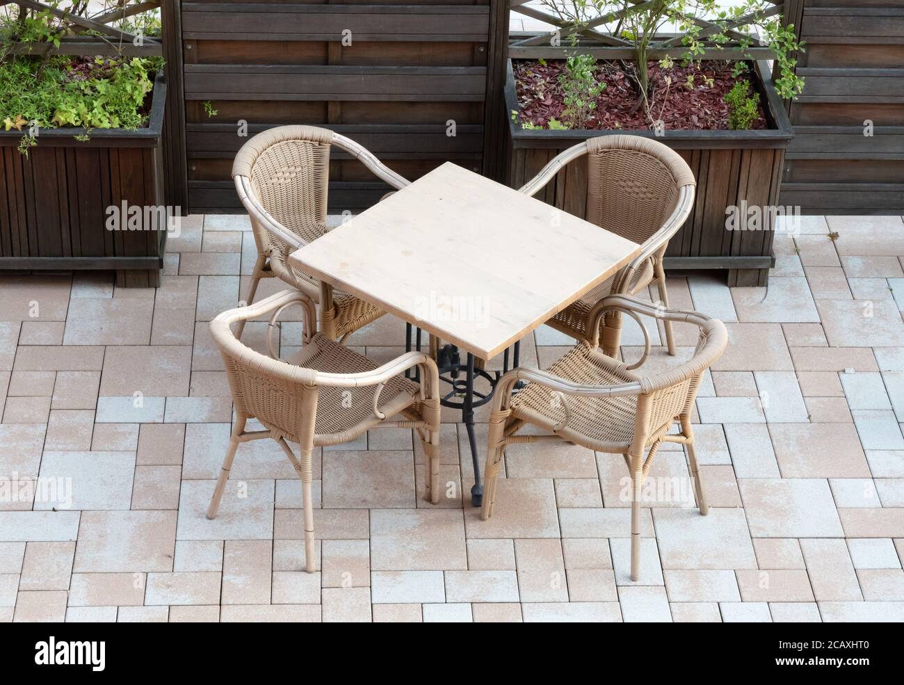 Cafe terrace with empty tables and chairs Stock Photo - Alamy
