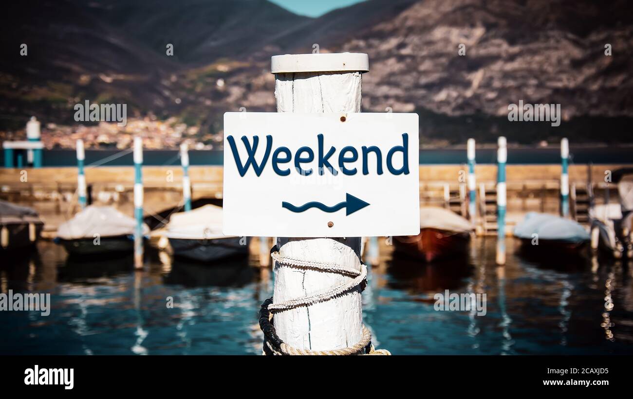 Street Sign the Direction Way to Weekend Stock Photo - Alamy