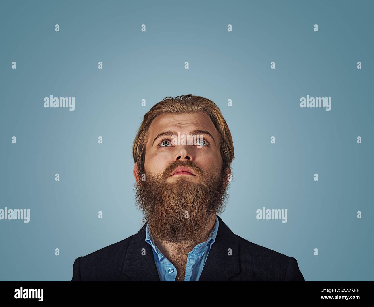 Head shot confused serious hipster business man thinking looking up ...