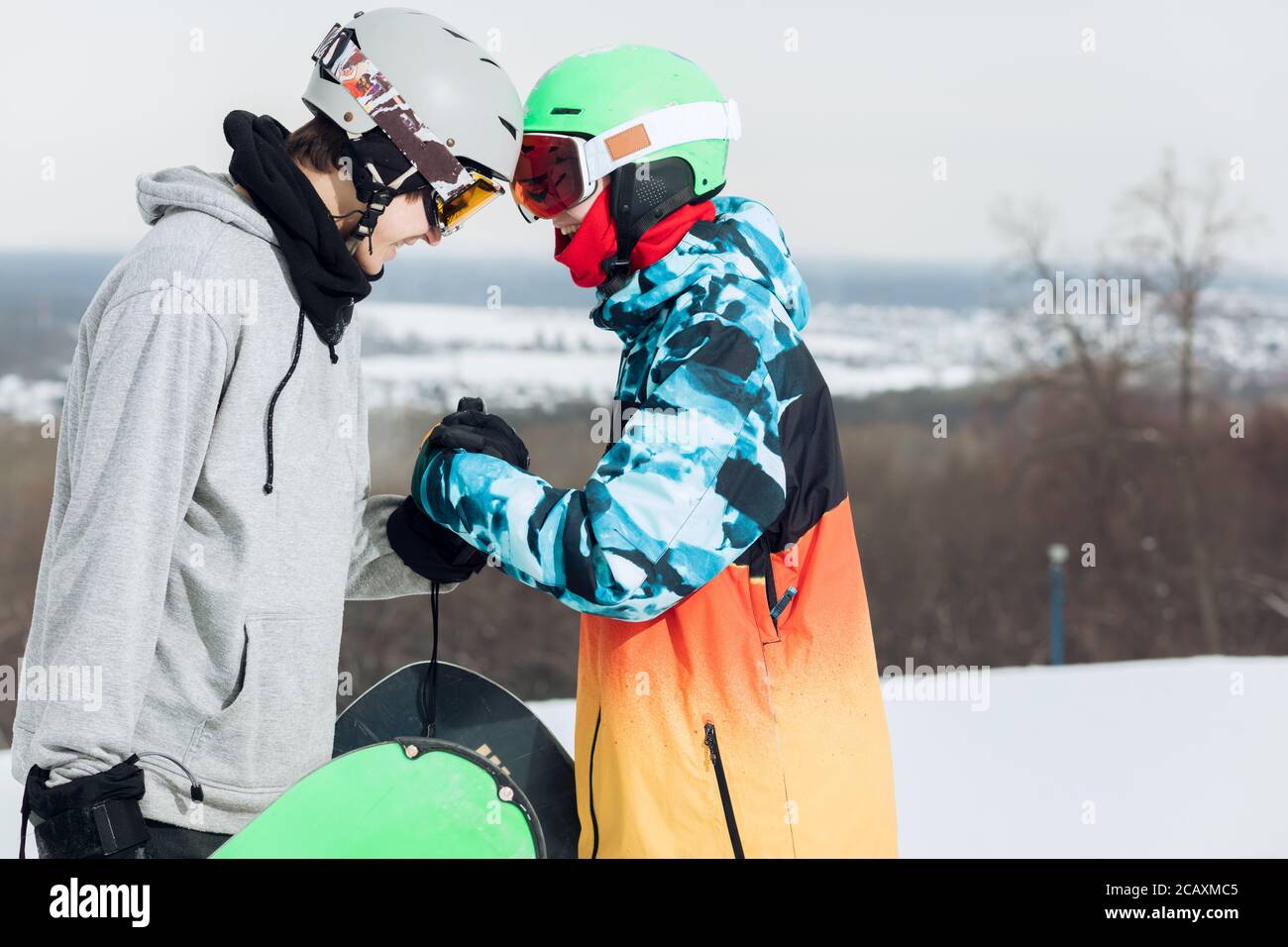young good looking girl and guy celebrating their achievements in sport ...