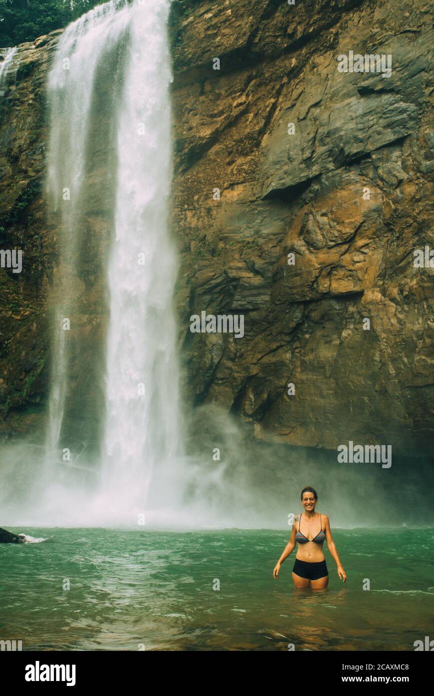Girl Under Waterfall High Resolution Stock Photography and Images - Alamy