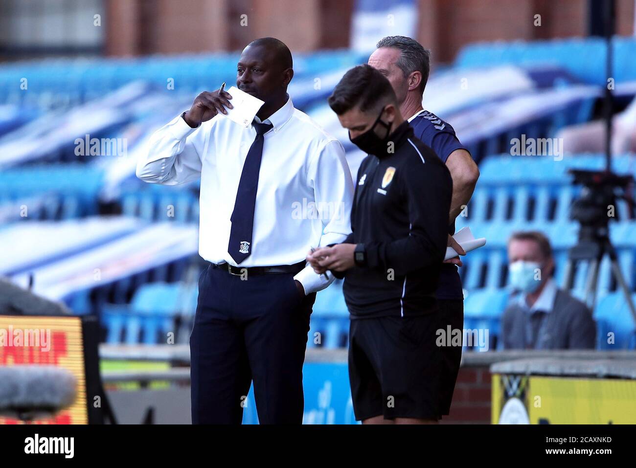 Kilmarnock manager Alex Dyer (left) looks on during the Scottish ...