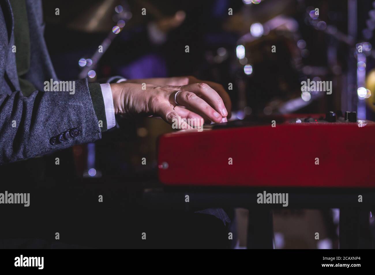 Concert view of a musical keyboard piano player during musical jazz ...