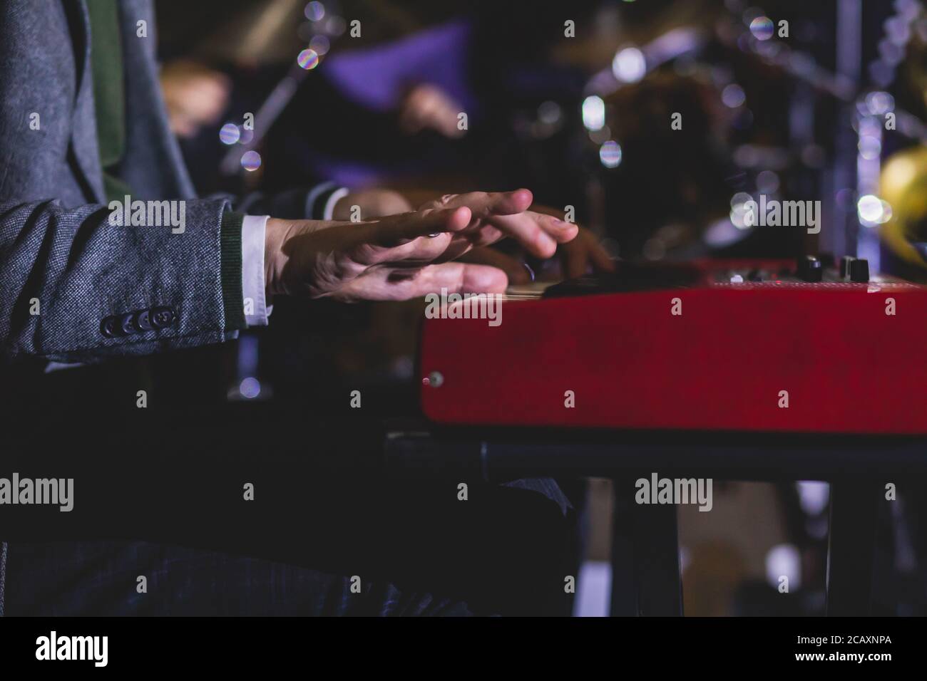 Concert view of a musical keyboard piano player during musical jazz ...