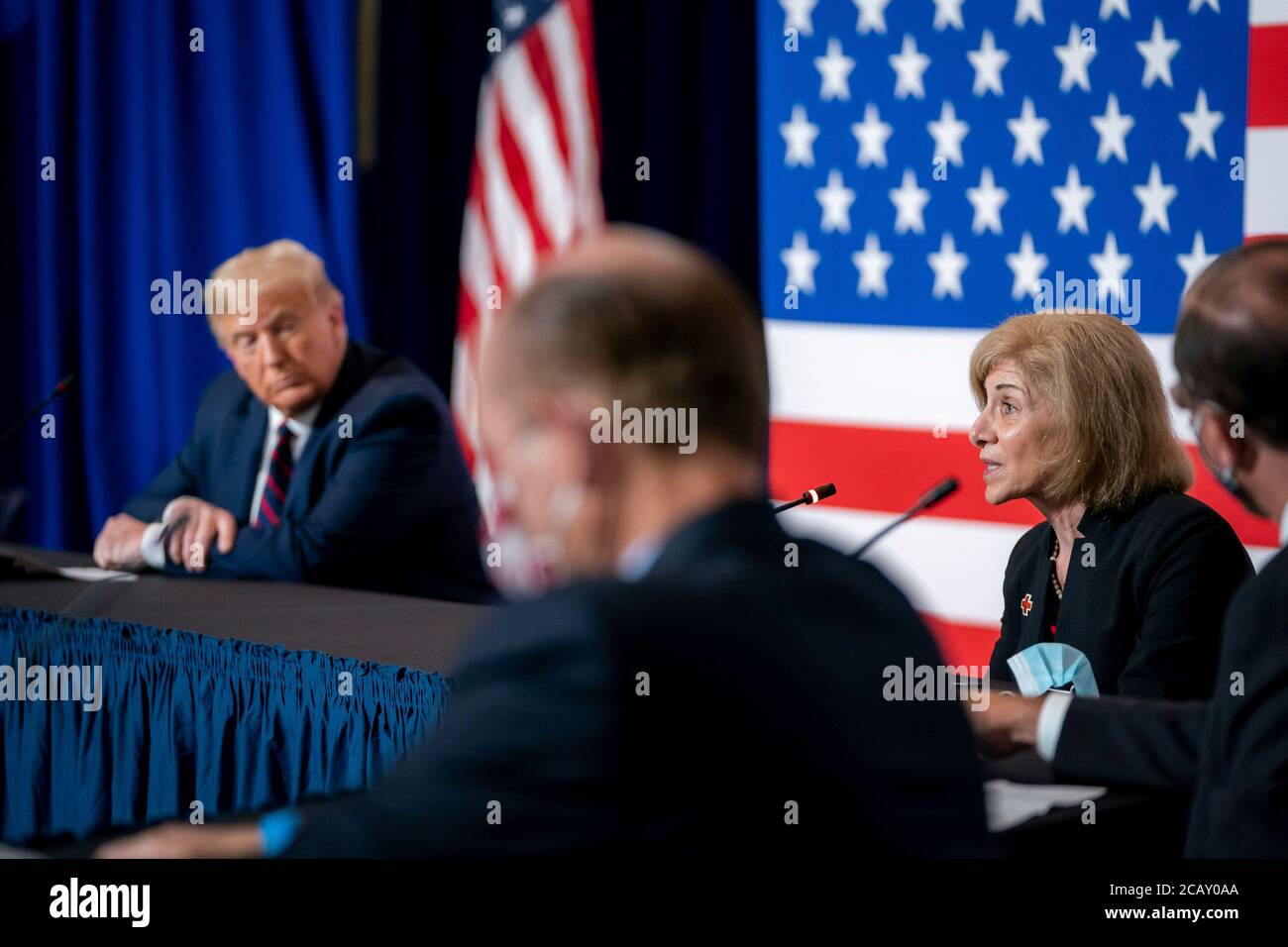 U.S. President Donald Trump listens as Gail McGovern, CEO of the ...