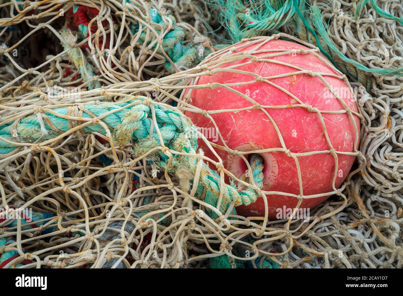 Detail of an old fishing net Stock Photo - Alamy