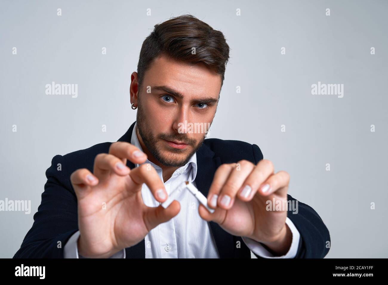 Suit man smoking break hi-res stock photography and images - Alamy