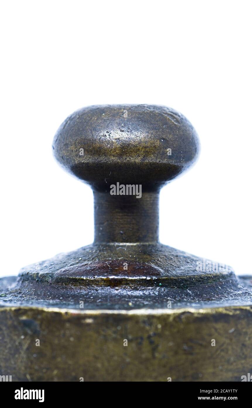 Iron weight on white background. Weighting tool Stock Photo - Alamy