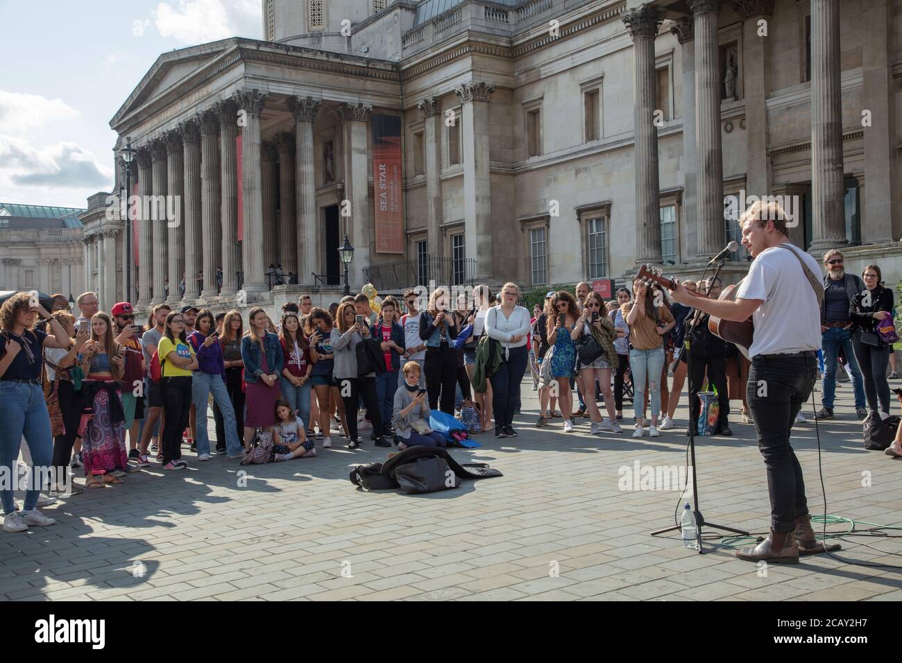 Listening trafalgar square london hi-res stock photography and images ...
