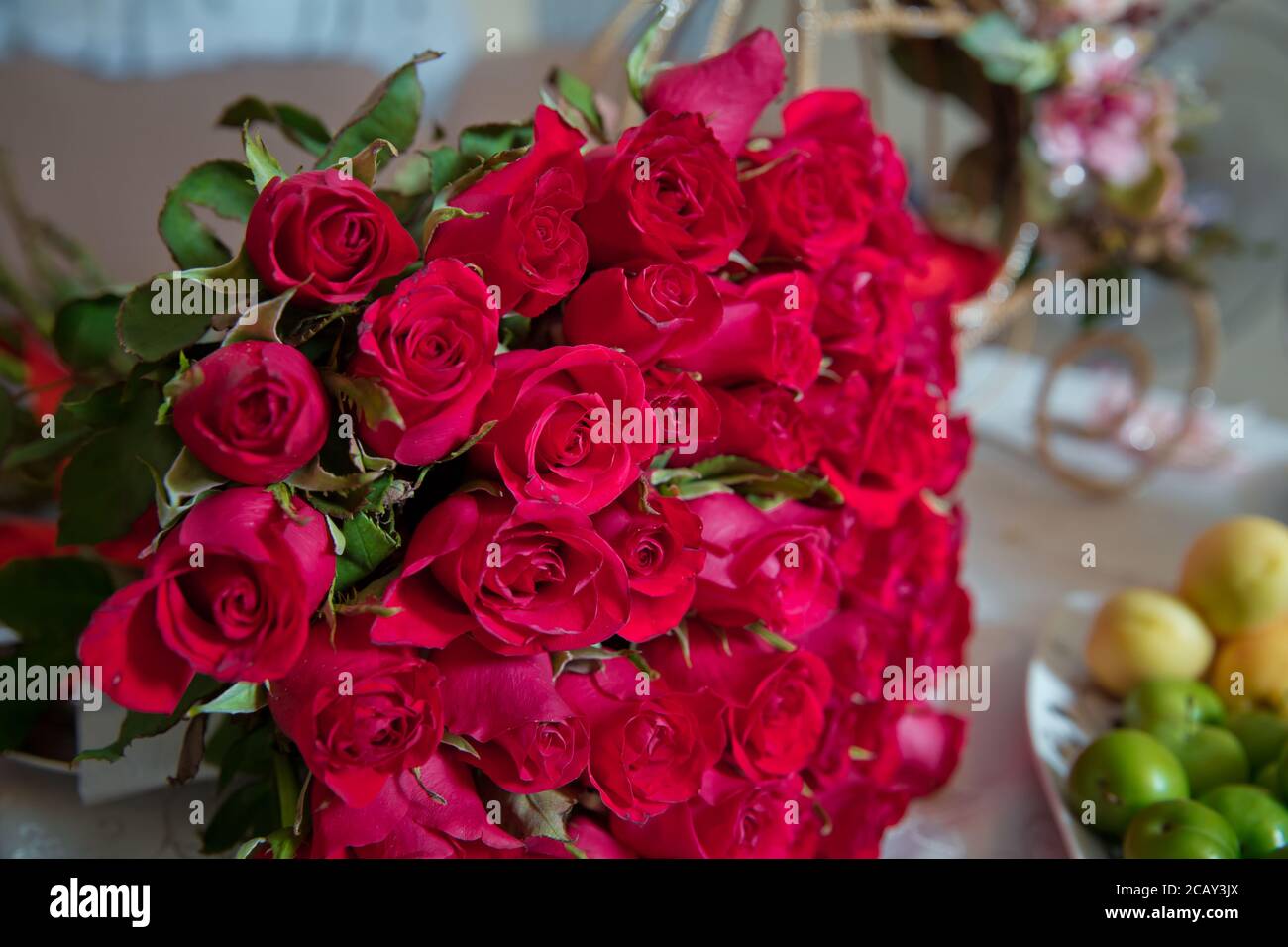 Big bouquet of one hundred big red roses flowers . A bouquet of flowers ...