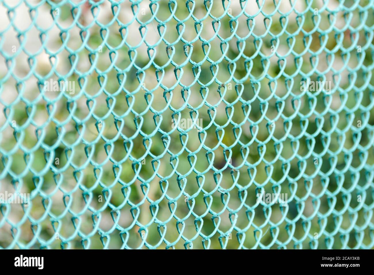 Green fence, side view. Green Background Stock Photo - Alamy
