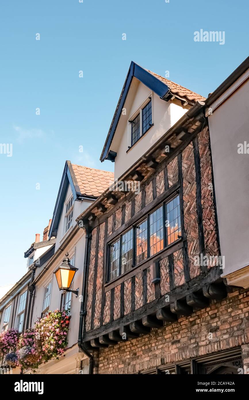 Historical crooked building with exposed beams in the city of Norwich ...