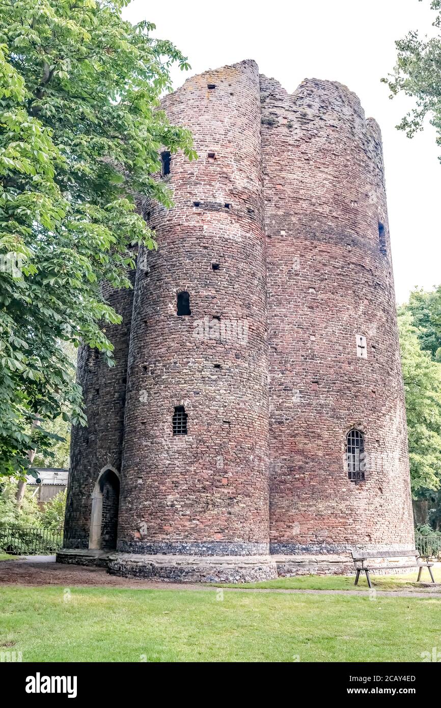 The historical Cow Tower on the bank of the River Wensum in the city of ...