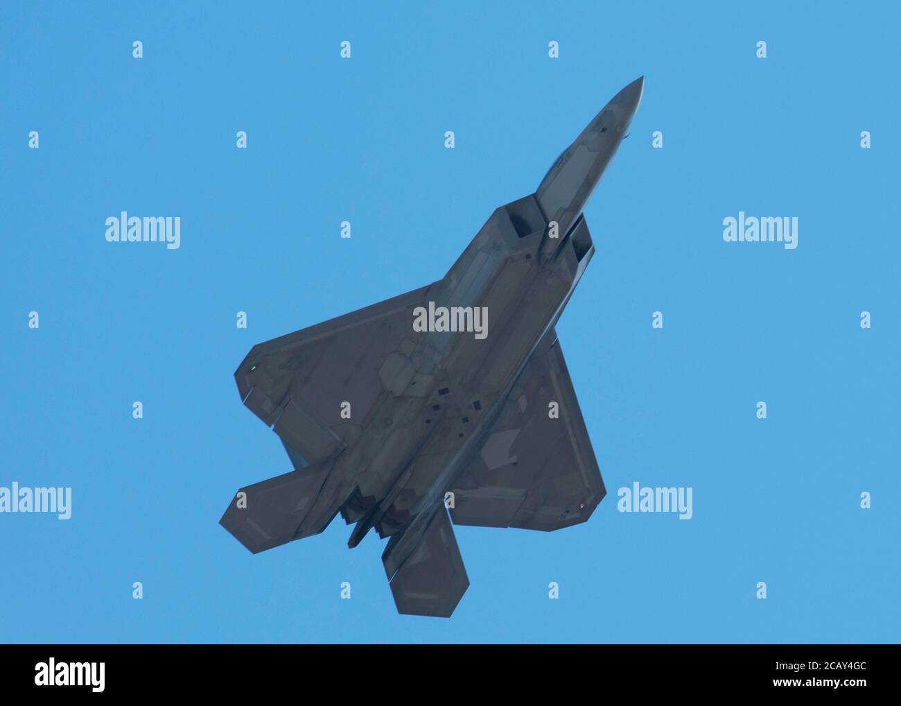 A U.S. Air Force F-22 Raptor aircraft assigned to the 3rd Wing flies ...