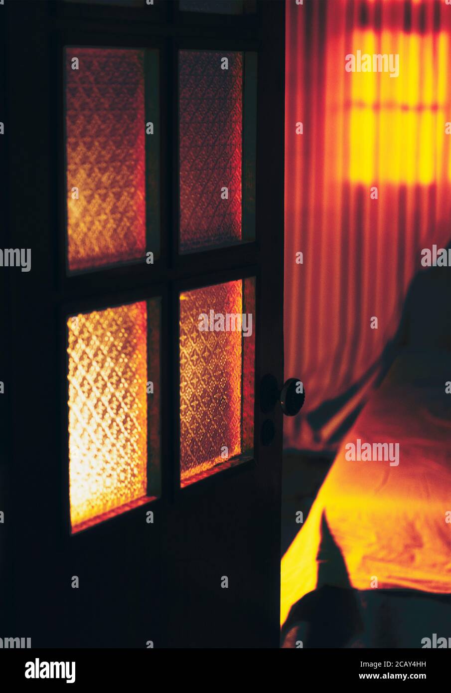 Dimly lit bedroom in an old house Stock Photo - Alamy