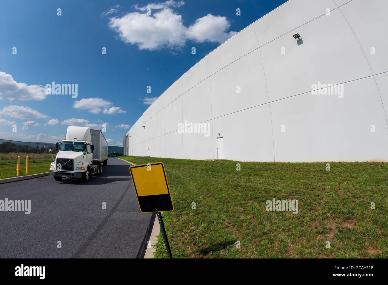 Warehouse with trucks Stock Photo - Alamy