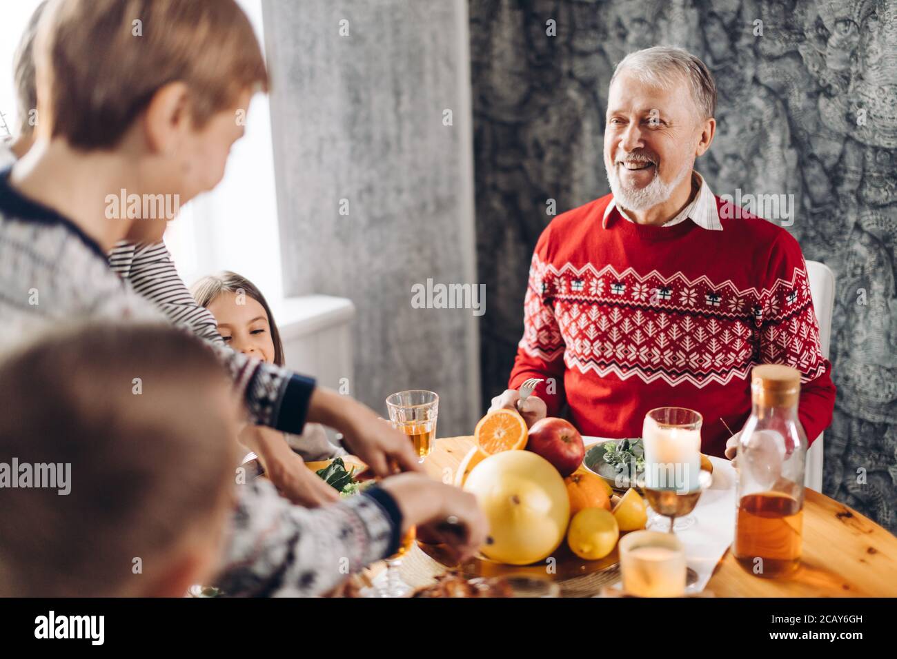 cheerful family celebrating grandparent's birthday. closeup portrait ...
