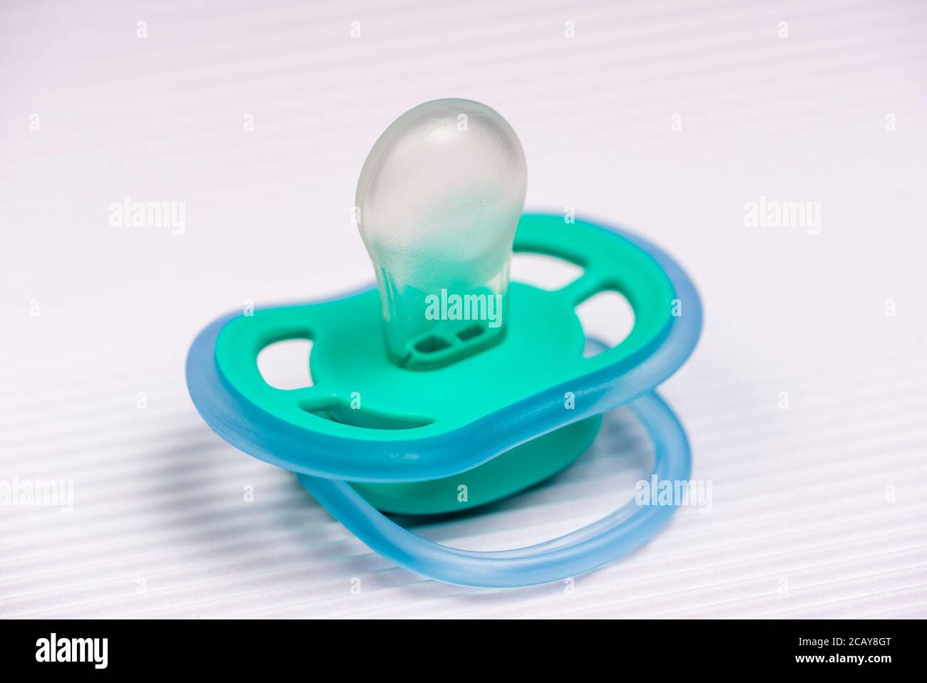 Blue pacifier isolated on white background. pacifiers colored pacifiers ...