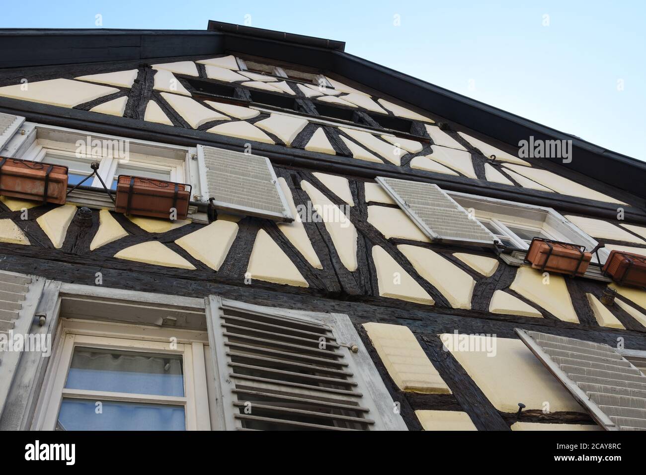 Facades of gable roof half-timbered house in close up built in ...