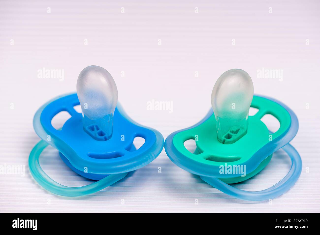 Blue pacifier isolated on white background. pacifiers colored pacifiers ...