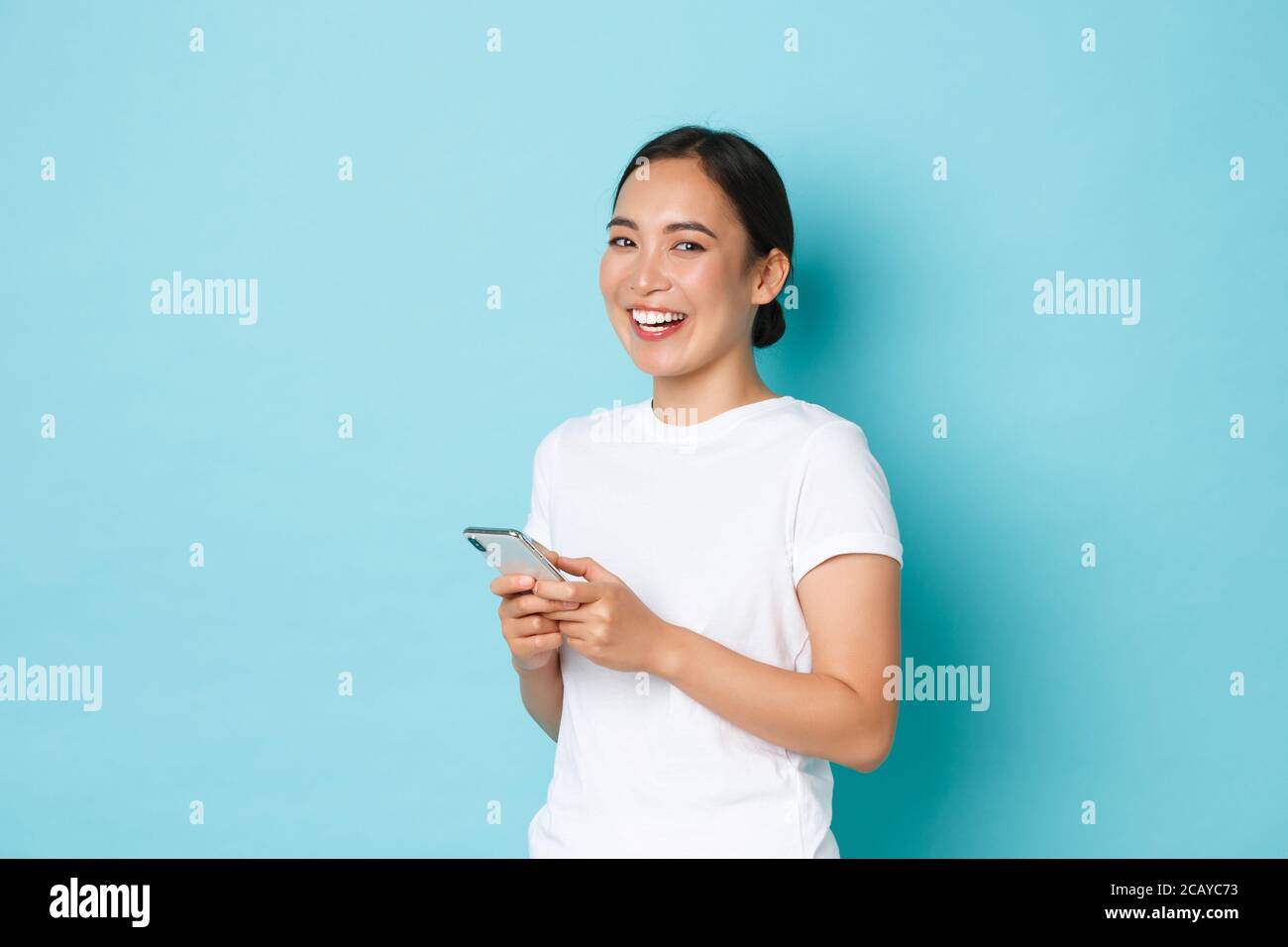 Lifestyle, technology and e-commerce concept. Side view of attractive ...