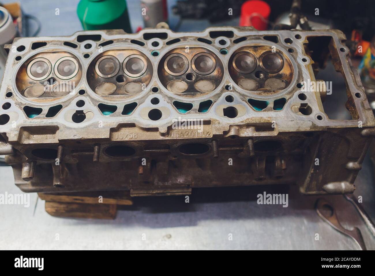 Engine valve car maintenance.The cylinder block of the four-cylinder ...