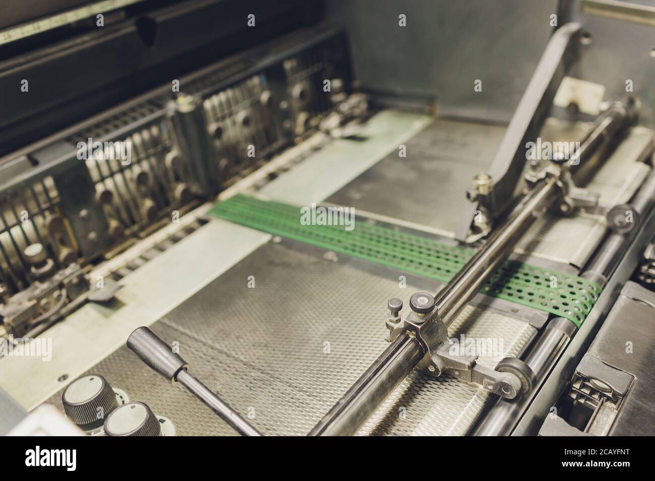 Print screening metal machine. Industrial printer. Serigraphy workshop ...