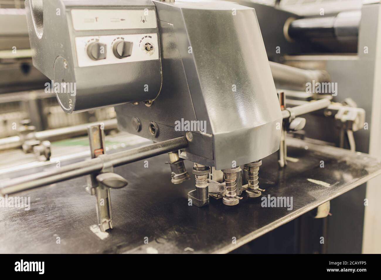 Print screening metal machine. Industrial printer. Serigraphy workshop ...