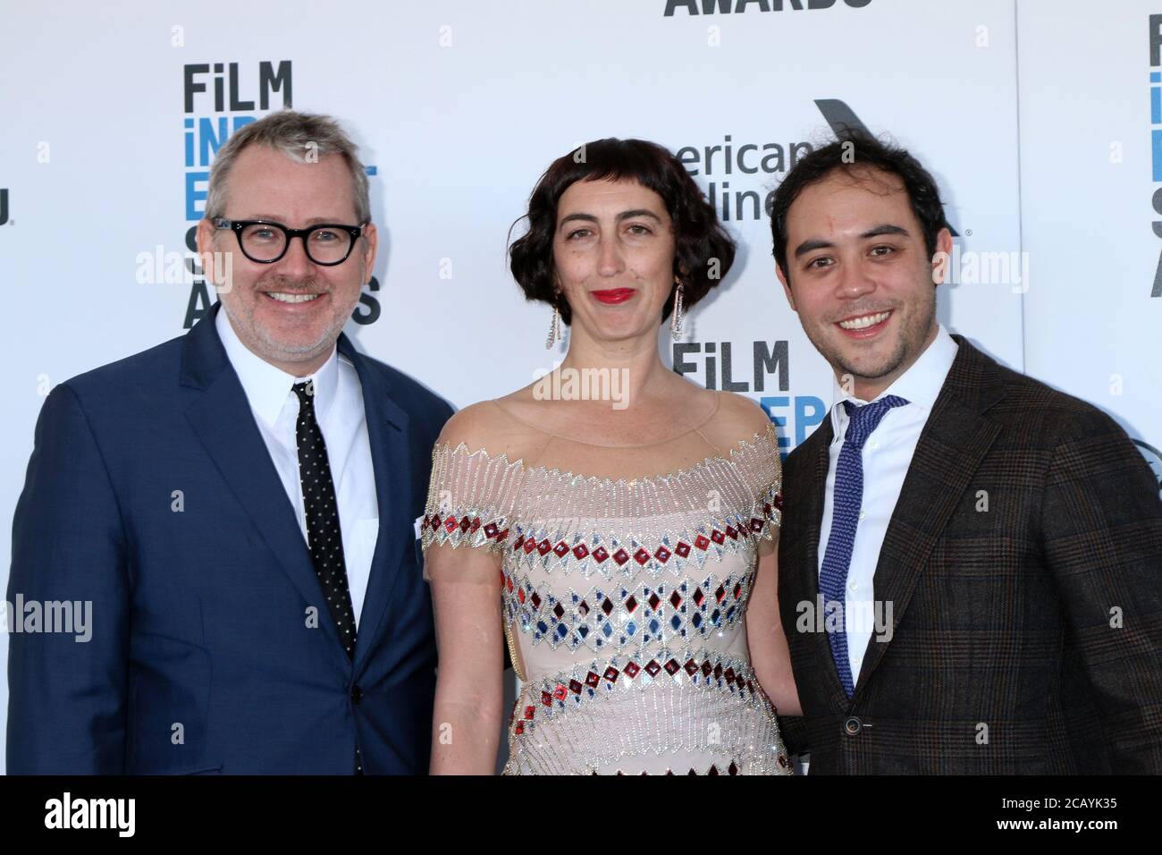 LOS ANGELES - FEB 23: Morgan Neville, Caryn Capotosto, Nicholas Ma at ...