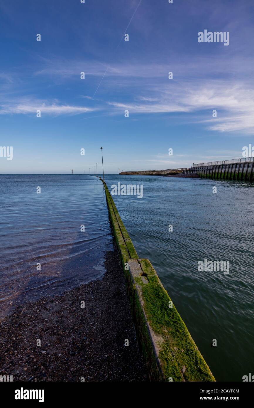 Jetty dividing the mouth of the River Arun and the East Beach ...