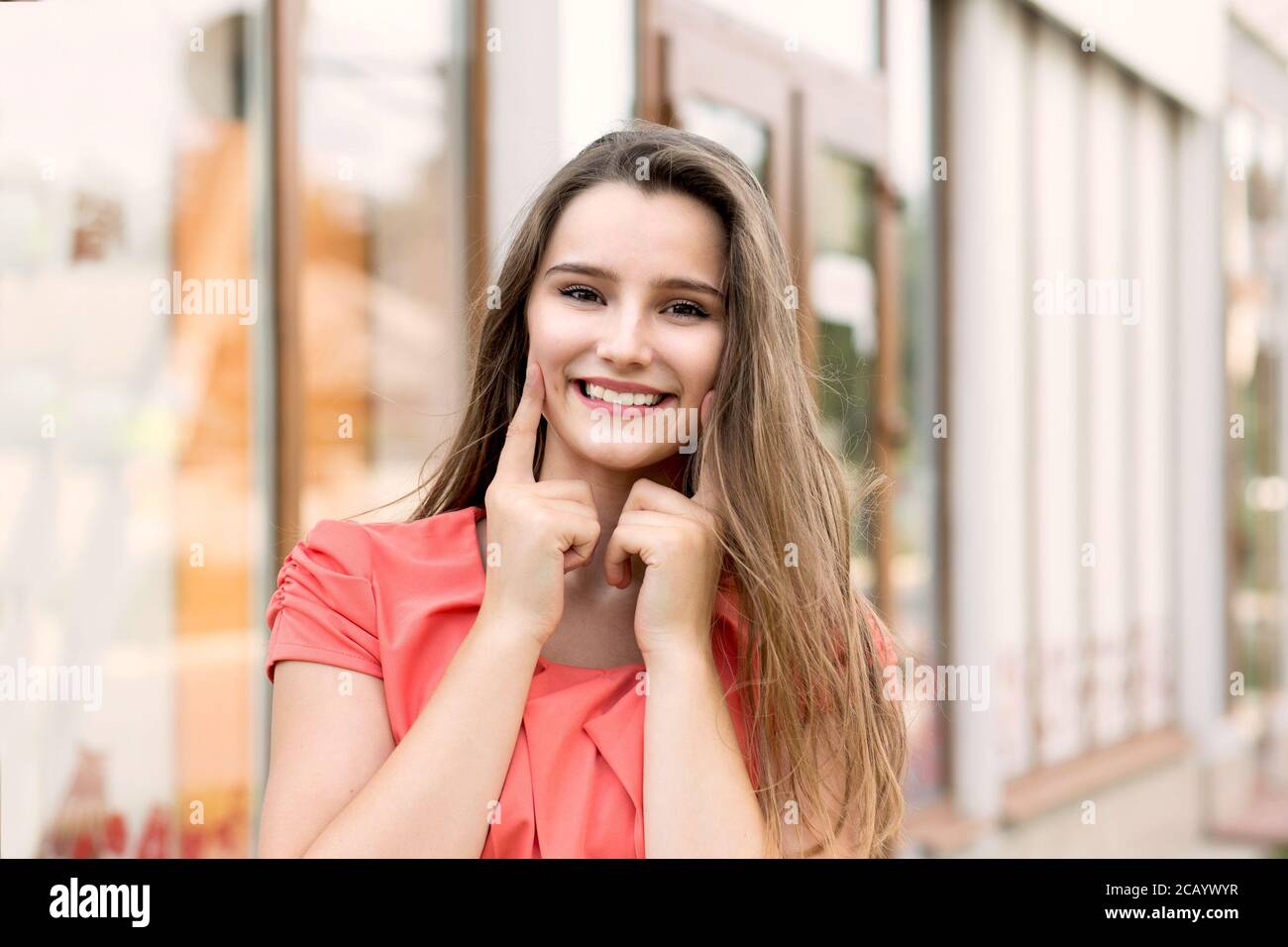 Happy. Close-up portrait of fair-haired woman smiling having showing ...