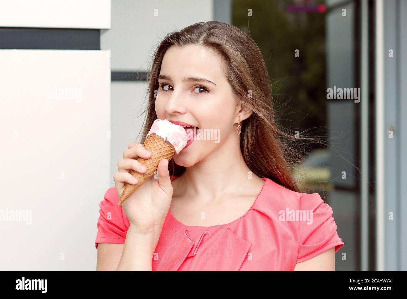 Happy Girl Eating Ice Cream Outdoors Near Store Beautiful Young Girl