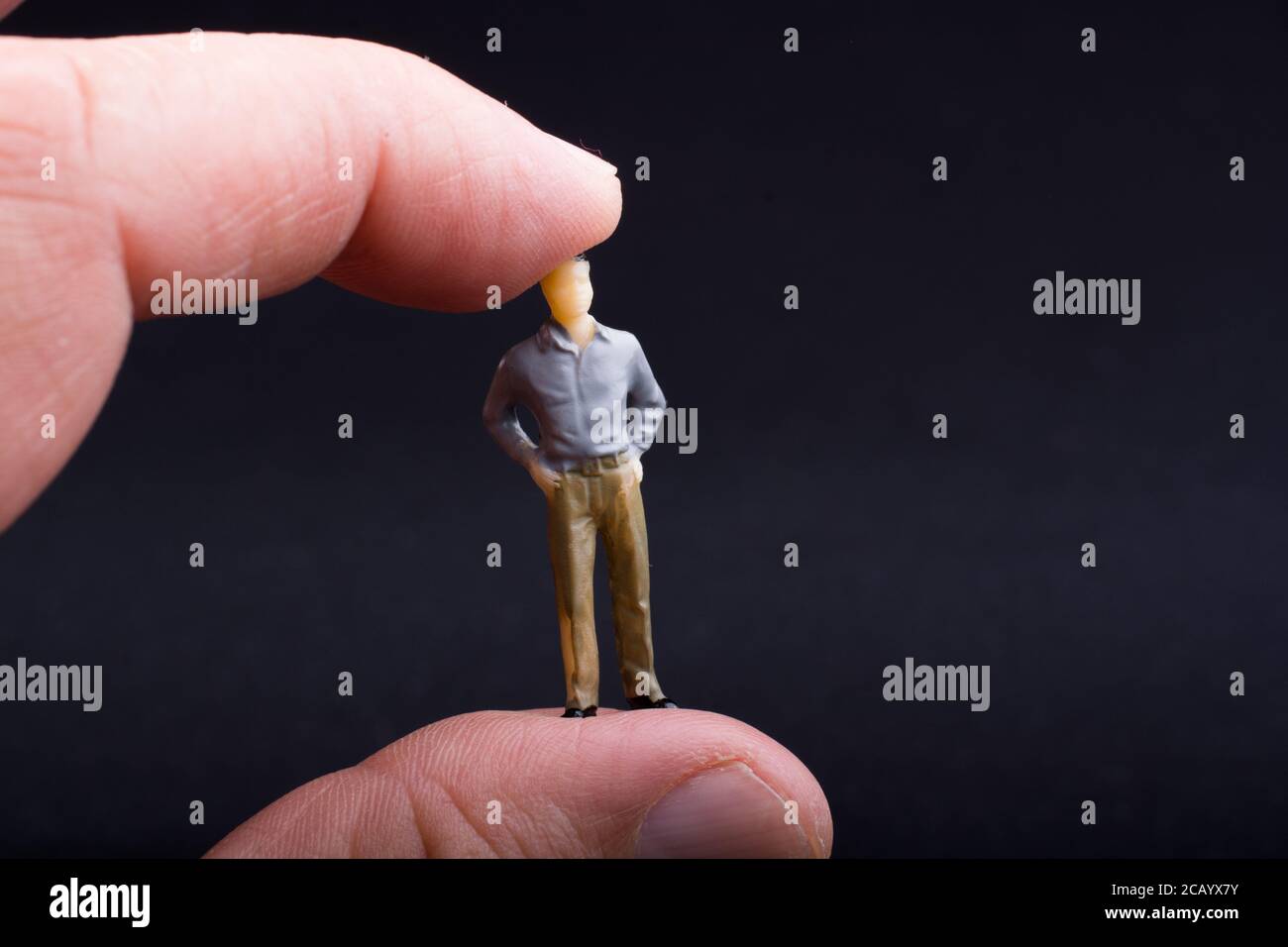 Little tiny man figurine in view Stock Photo - Alamy