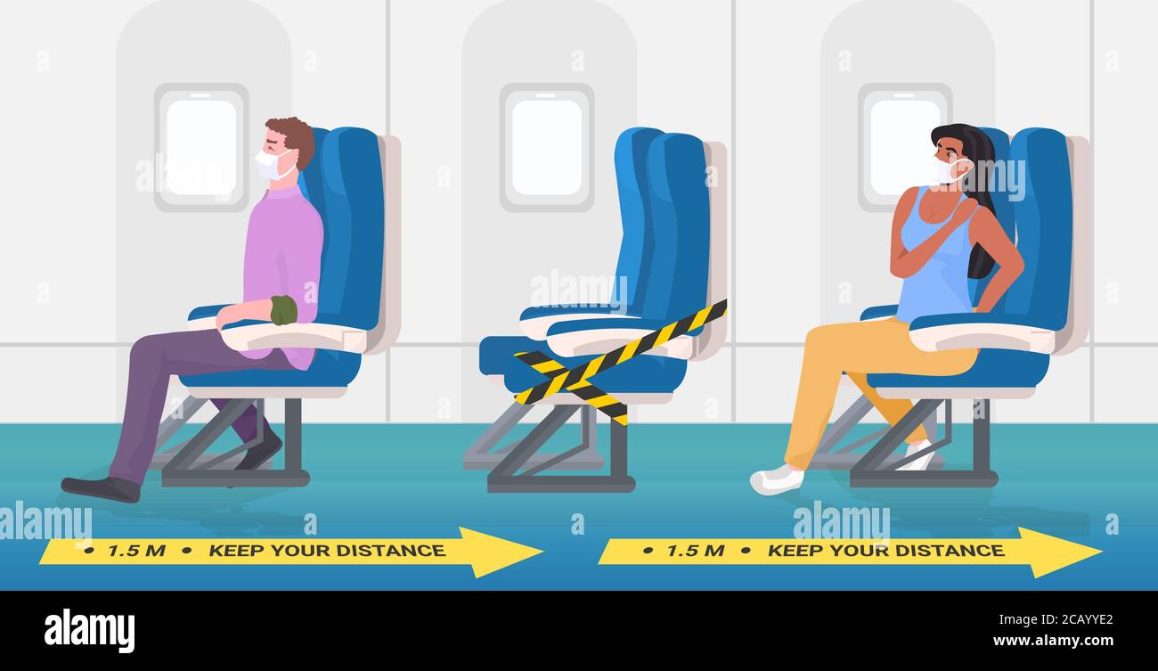 airplane passengers in protective masks keeping distance to prevent ...
